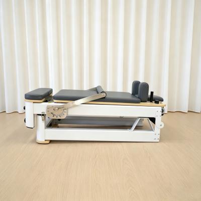China High Quality Aluminum Pilates Reformer Adjustable Foldable Core Bed Yoga Fitness Machine for sale