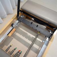 China Professional Beech Wood Pilates Reformer with Integrated Footbar and Adjustable Spring Resistance for sale