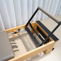 China Integrated Footbar, Complete Pilates Accessories, Adjustable Resistance Springs for Studio Beech Wood Pilates Reformer Machine Beech Wood Pilates Reformer with Integrated Footbar Full Accessories for sale