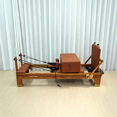 China Factory Direct Wenge Wood Pilates Reformer Machine with Jump Board and Complete Accessories
OEM ODM Wenge Wood Pilates Reformer Machine Manufacturer for Pilates Studio Equipment for sale