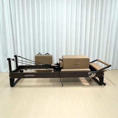 China Manufacturer with Tower System and Adjustable Footbar for Studio & Home Use, Plywood Pilates Reformer Machine for sale