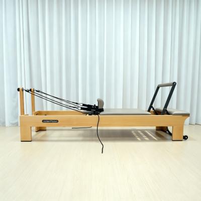 China Wooden Pilates Reformer Machine Beech Wood Integrated Footbar Full Accessories Custom Color Custom Logo Factory Supply for sale
