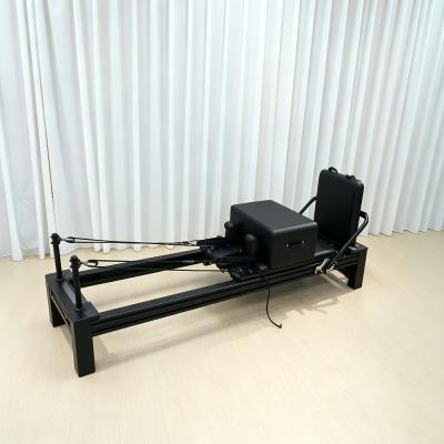 China Lightweight Pilates Reformer featuring aluminum alloy construction providing performance and ease of transport for studios for sale