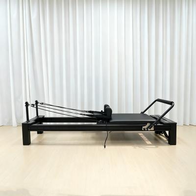 China Comprehensive Pilates Reformer apparatus featuring durable construction and versatile resistance options for fitness professionals for sale
