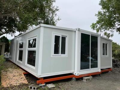 China 30FT Expandable Container House with Steel Security Door 56 Square Meter Floor Area and Customizable Color Options for sale