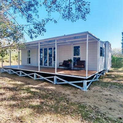 China 40ft Expandable Container Home with Folding Size 11800 × 6220 × 2480 mm Steel Roofing and Galvanized Steel Frame for sale