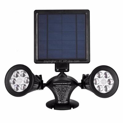 China Solar Energy Powered Dual Head Upgraded Double Spotlights 12 LED Outdoor Garden Light for sale