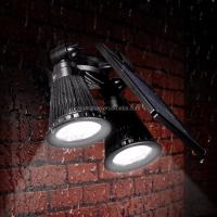 China Solar Energy Powered Dual Head Upgraded Double Spotlights 12 LED Outdoor Garden Light for sale