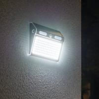 China 4 Lighting Modes Led Solar Outdoor Wall Porch Light With Motion Sensor IP65 Protection for sale