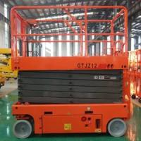 China Battery Operated Self Propelled Scissor Lift Mobile Orange For High Place Working for sale