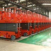 China Battery Operated Self Propelled Scissor Lift Mobile Orange For High Place Working for sale