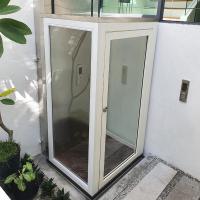 China Safety Home Wheelchair Lift 3m-10m Hydraulic Vertical Platform Lift With Cabin for sale