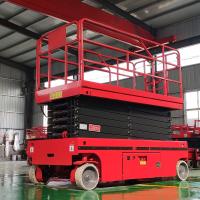 China 320KG 10 Meter Scissor Lift Red Self Propelled Man Lift For Warehouse for sale