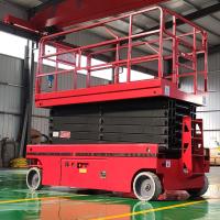 China 320KG 10 Meter Scissor Lift Red Self Propelled Man Lift For Warehouse for sale