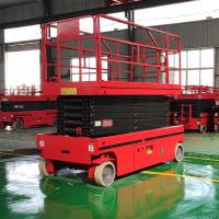 China 320KG 10 Meter Scissor Lift Red Self Propelled Man Lift For Warehouse for sale