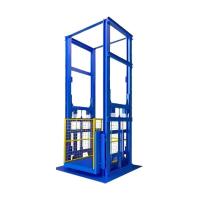 China Blue 3000kgs Warehouse Cargo Elevator 3m-9m Mini Goods Lift for sale