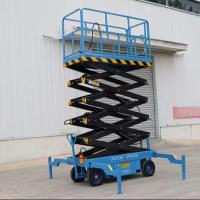 China 500KG Semi Electric Scissor Lift 6m Height Mobile Platform for sale