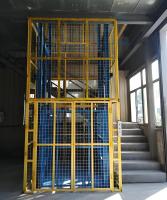 China Electric Cargo Lift Hydraulic Caged Freight Elevator Warehouse Goods Vertical Handling for sale