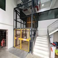 China Electric Cargo Lift Hydraulic Caged Freight Elevator Warehouse Goods Vertical Handling for sale