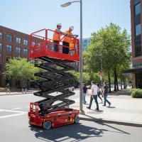 China 320kg 10m Small Red Self Propelled Hydraulic Scissor Lift Platform for sale
