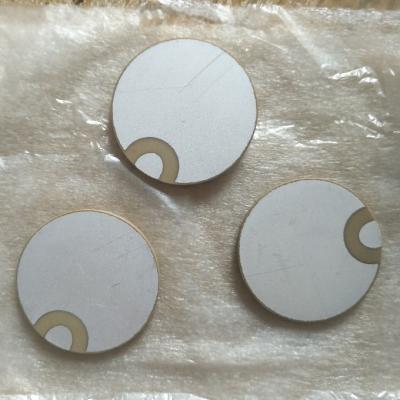 China 50mm Element Piezoelectric Ceramic Pzt Round Shape Two Electrodes In Same Side for sale