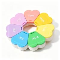China Round Weekly Pill Organizer 7-Color Heart-Shaped Medicine Box for Travel for sale