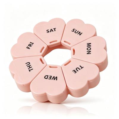 China Round Weekly Pill Organizer 7-Color Heart-Shaped Medicine Box for Travel for sale