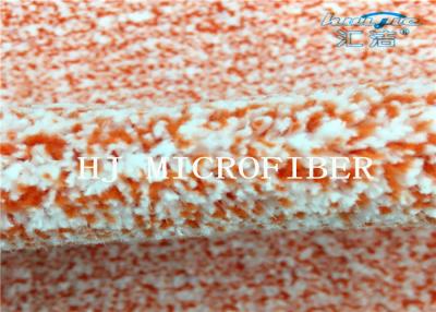 China Orange Mixed Knitted Microfiber Coral Fleece Fabric With Nylon Hard Wire for sale