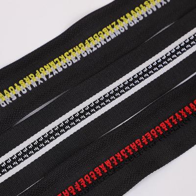 China Luggage Bags #5 Resin Gold Teeth Zipper Eco Friendly Smooth Sliding Zipper for sale
