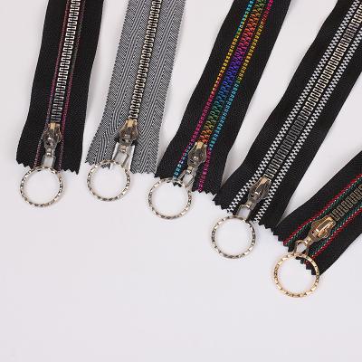 China Lightweight Resin Coil Zipper #5 Gold Tooth For Designer Suitcases for sale
