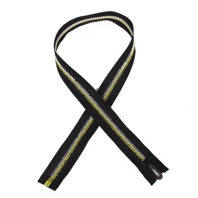 China Workwear Lightweight #5 Resin Coil Zipper With Gold Coated Resin Teeth for sale