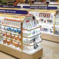 China Free standing wood cosmetic display stand cosmetic product store shelf nail polish display cabinets for sale