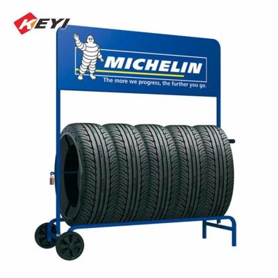 China Custom Logo Removable Metal 5 Car Wheel Display Stand With 2 Caster for sale