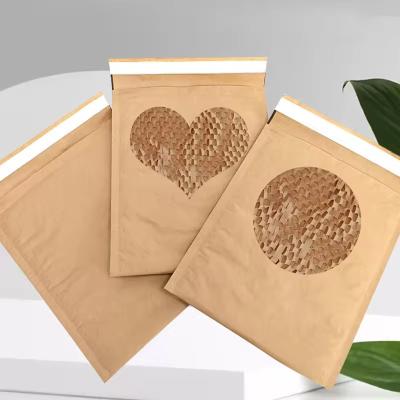 China Lightweight Recyclable Kraft Honeycomb Paper Mailer For Secure Shipping for sale
