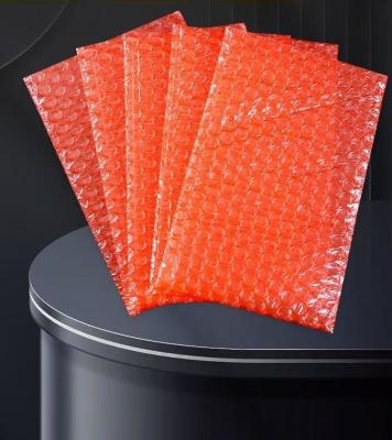 China Circle Bubble Shape Red Bubble Film Bag Exceptional Cushioning and Protection for Your Products and Goods for sale