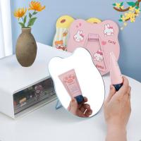 China Mini Round Custom Pocket Heart Shaped Adjustable Light Makeup Mirror for Lady Dressing for sale