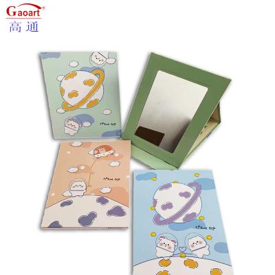 China Coated Paper and Glass Mirror The Ideal Combination for a Cute Folding Makeup Mirror for sale