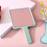 China Custom Travel Cosmetic Hand Mirror with Extra LOGO and Modern Style Makeup Benefits for sale
