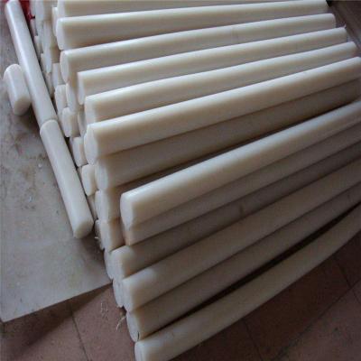 China wear resistant Food Grade natural color UHMWPE Plastic round bar cut to size for sale