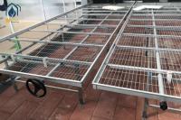 China Indoor Greenhouse Wire Mesh Seed Bench Adjustable Height Nursery Seedbed Rolling Bench for sale