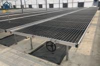 China Greenhouse Movable Plastic Seedling Tray Rolling Bench Seedbed For Orchid Farming for sale