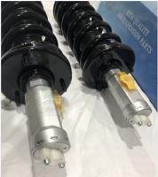 China E61006JE7A Front Shock Absorber For Nissan Patrol Infiniti QX56 QX80 Coil Suspension Shock for sale