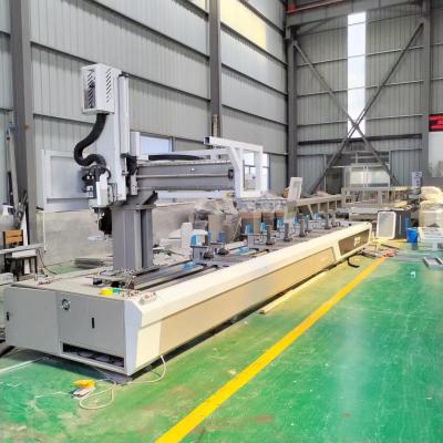 China 4 Axis CNC Aluminum Profile Machining Center 7000mm Automatic Drilling Milling 9.6kW for sale