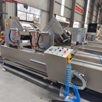 China Digital Display Double Head Front Sawing Machine with 600mm Saw Blade for 45° and 90° Cutting for sale