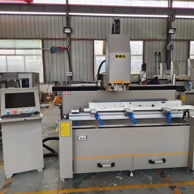 China 3 Axis CNC Drilling Milling Machine 3.5KW Double Spindle for Aluminum Window Door Furniture Making for sale