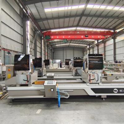 China CNC Double Head Mitre Saw 45 90 Degree Aluminium UPVC Cutting Machine 550mm Blade for sale