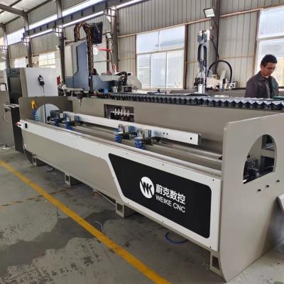 China Automatic Tool Change 3+1 Axis Aluminium Profile CNC Machining Center For Making Window Door Curtain Wall Etc for sale