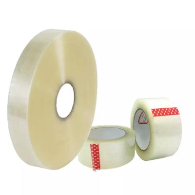 China Clear Bopp Tape 1000m 500m Transparent Yellowish Tan Color Bopp Packing Adhesive Tape Rolls for sale