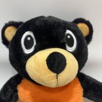 China Heated Black Bear Plush Toy Orange Black Warming Doll Heatable Hand Warmer Bed Warmer Winter Gift for sale