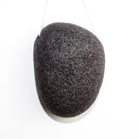 China Skincare Bamboo Charcoal Facial Konjac Sponge Rid Dirt Organic Makeup Sponge for sale